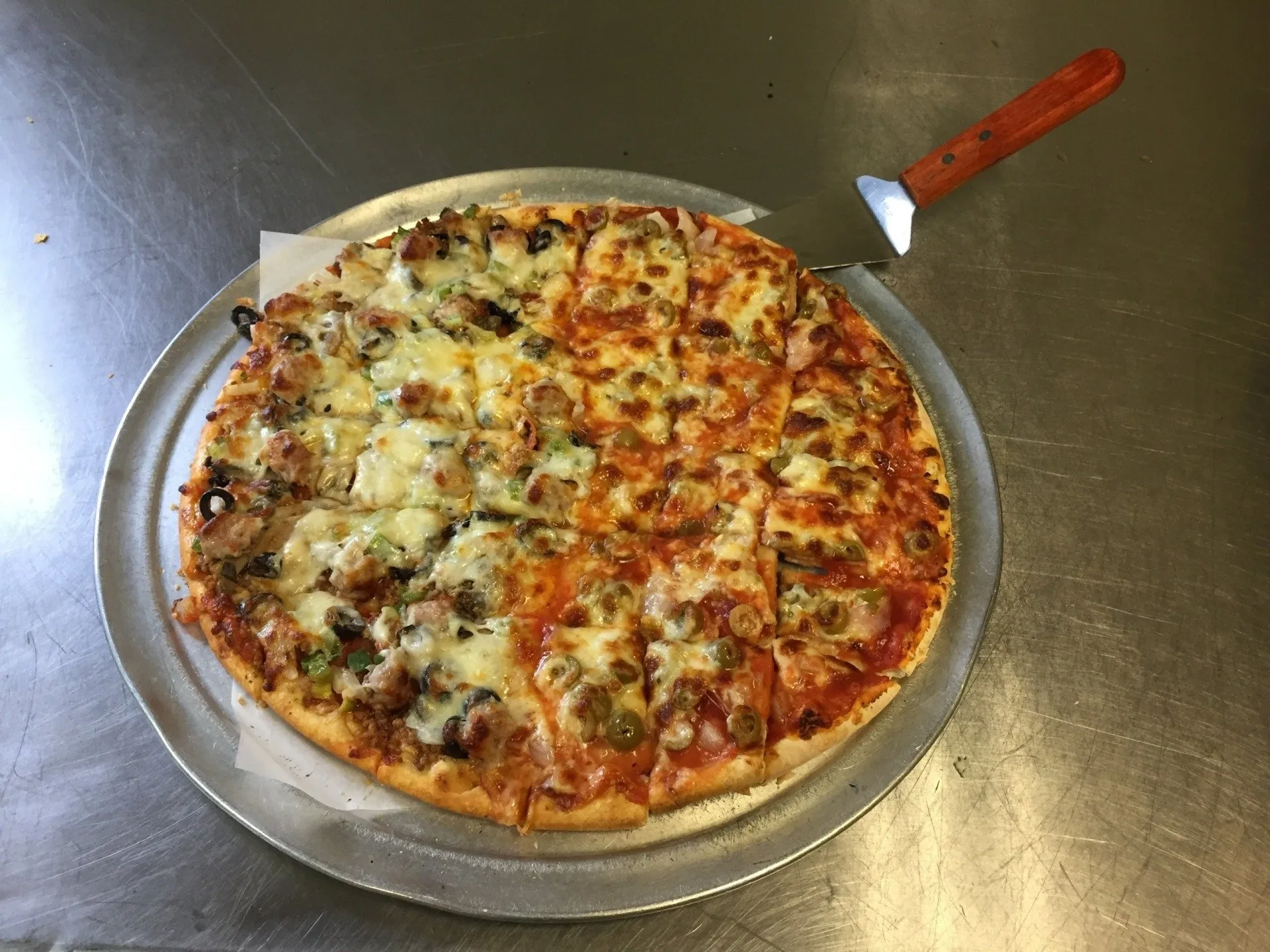 Mel's Sportspage Bar & Snickers Pizza Shop | Pizza | Virginia, MN