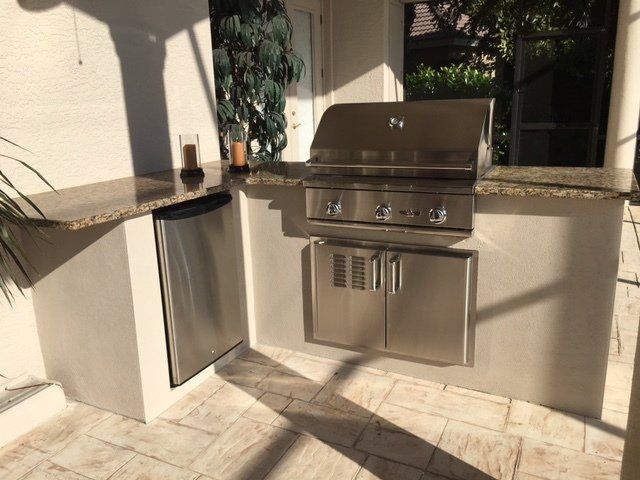 L-Shaped Outdoor Kitchens & Ideas | HL Posey Builders