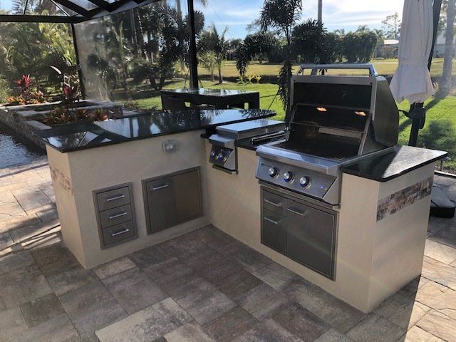 L-Shaped Outdoor Kitchens & Ideas | HL Posey Builders