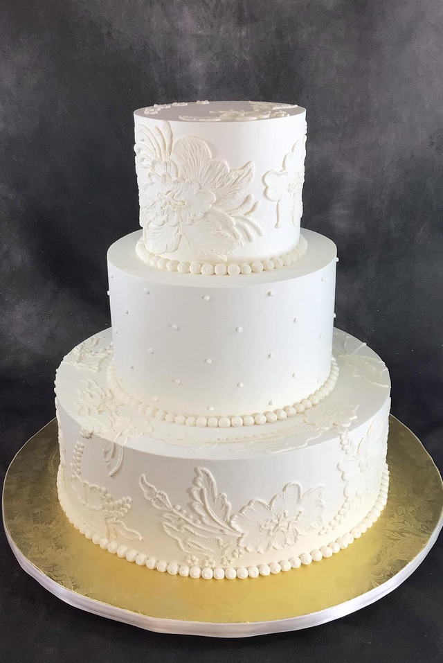 White Wedding Cake With Piping